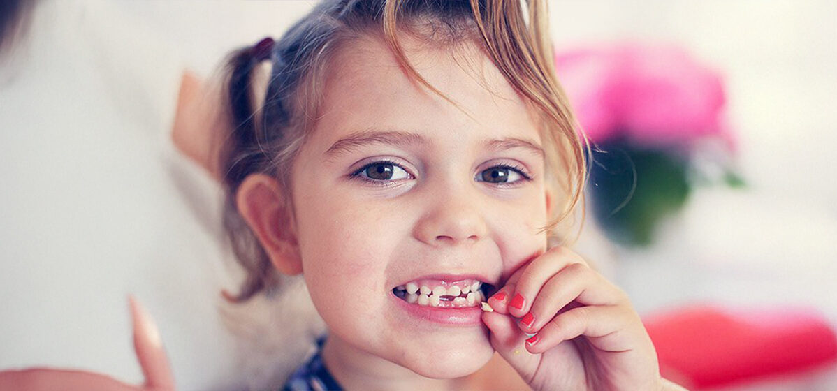 Planning for Your Child's First Loose Tooth - Embrace Family